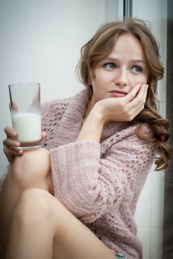 Young woman and milk. stock photo. Image of life, wellness - 27428306