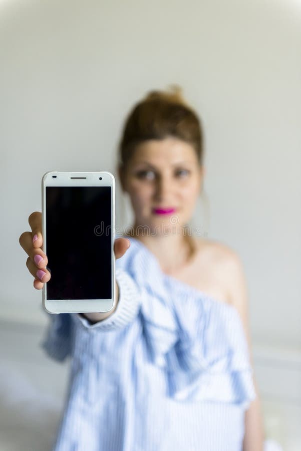 Young Woman with Mobile Phone Stock Photo - Image of typing, lifestyle ...