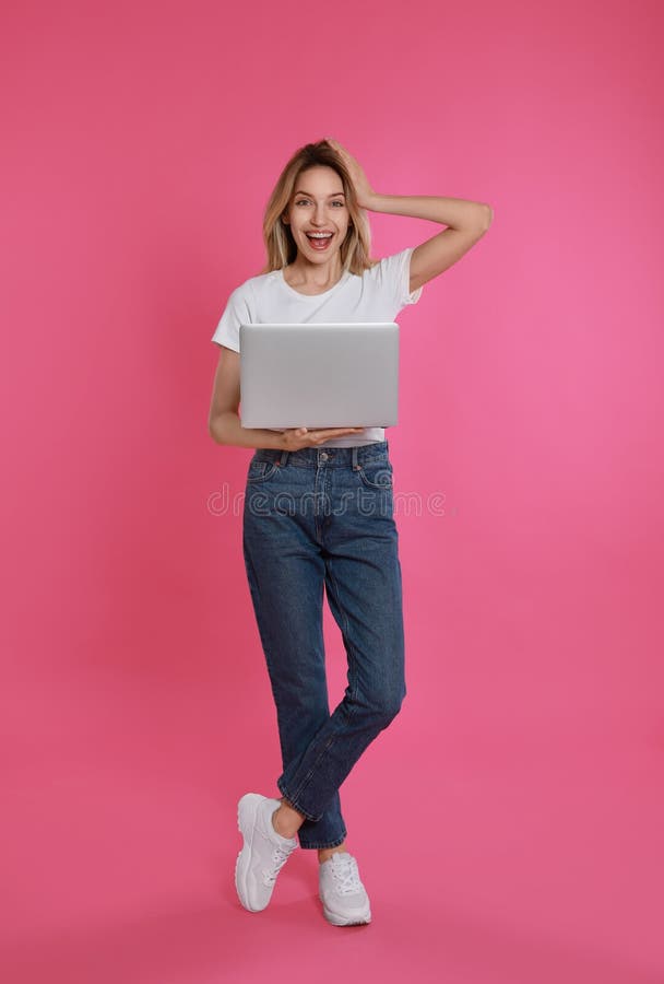 Young Woman with Modern Laptop on Pink Background Stock Photo - Image ...