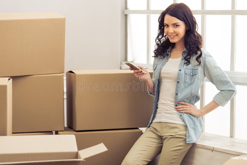 Young woman moving stock image. Image of adult, lifestyle - 70338527