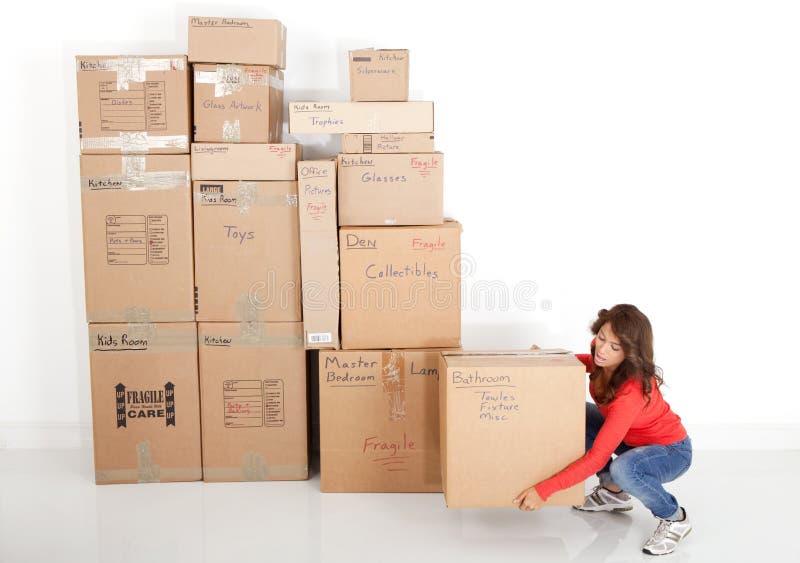 Young Woman Moving Boxes with with a Hand Truck or Dolly. Stock Image ...