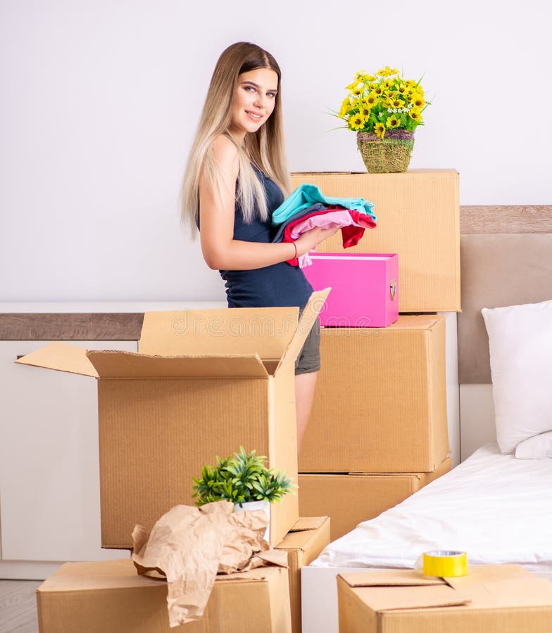 Young Woman Moving To New Place Stock Image - Image of housing ...