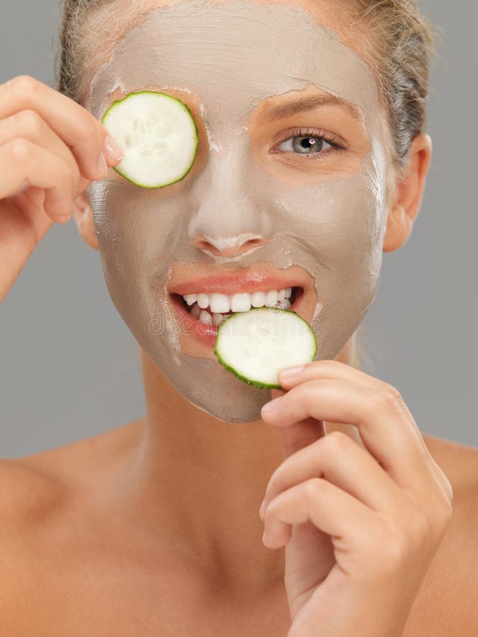 Close Up of Beautiful Girl with Facial Mask of Cucumber and Clay Stock ...