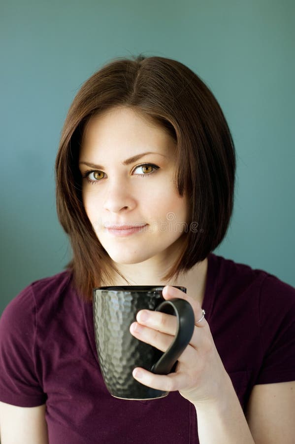 Young woman with mug stock image. Image of face, hazel - 19457447