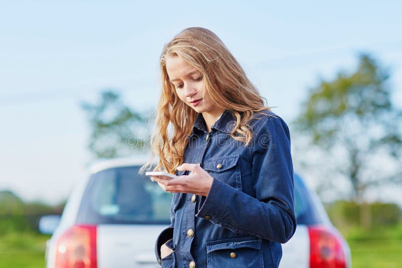 Young Woman Near a Broken Car Calling for Help Stock Photo - Image of ...