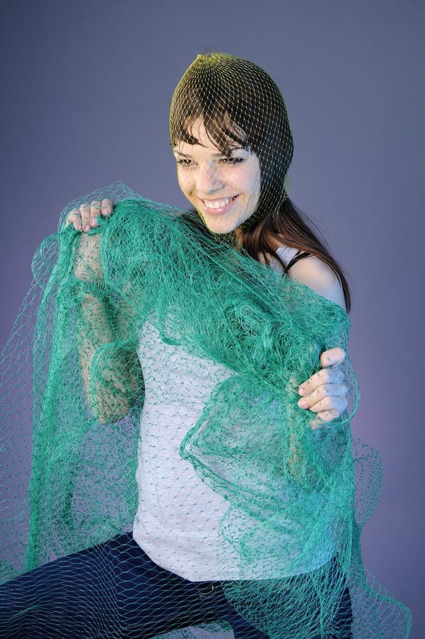 Young woman in netting stock image. Image of model, objects - 13005031