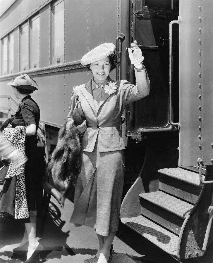 Young Woman Next To Train Waving Stock Image - Image of female, 2530: ...