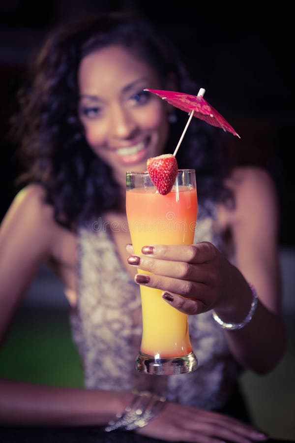 Young Woman Offering a Cocktail at Bar Counter Stock Photo - Image of ...