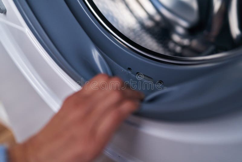 Young Woman Opening Washing Machine at Laundry Room Stock Image - Image ...