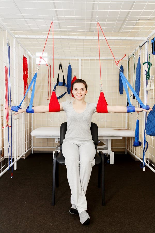 Young Woman Patient Doing Physical Exercises in a Rehabilitation Study ...