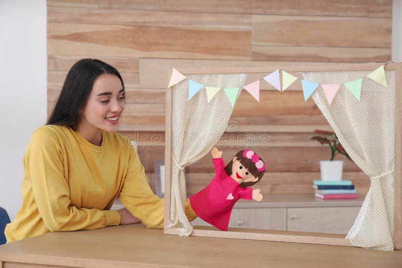 Young Woman Performing Puppet Show at Home Stock Photo - Image of craft ...