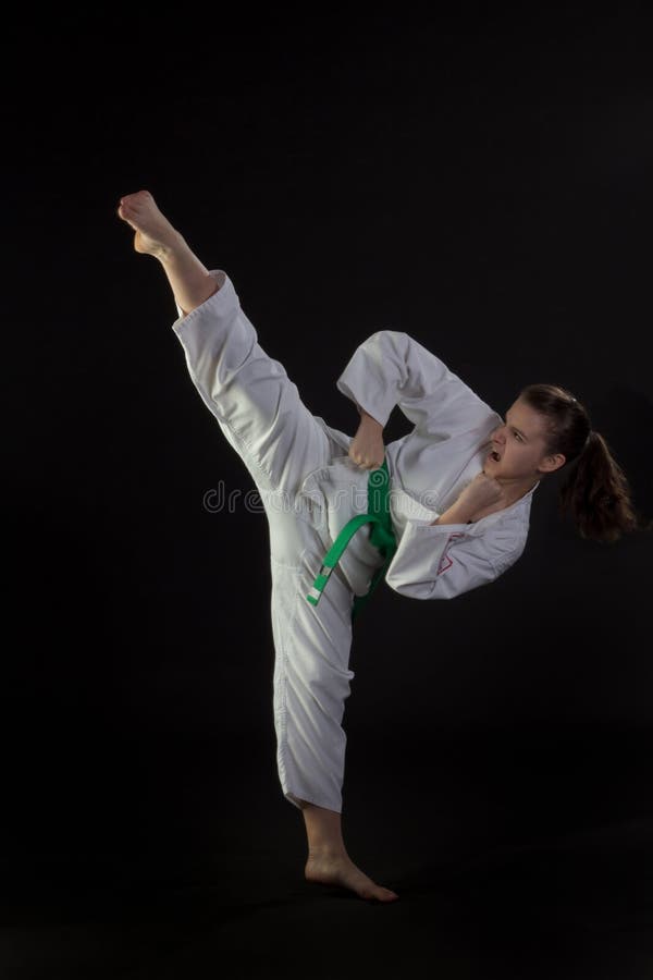Young Woman Performing Tae Kwon Do High Kick Stock Image - Image of ...