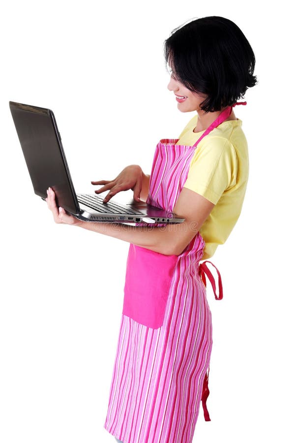 Young Woman in Pink Appron Using Laptop Stock Photo - Image of enjoying ...