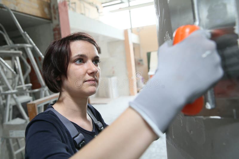 Young Woman Plasterer Working Stock Image - Image of plastering ...