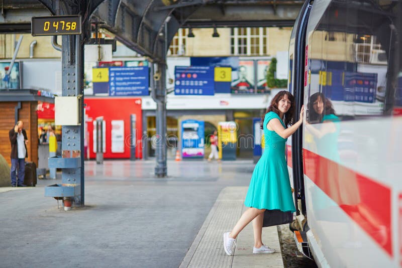 Young Woman on the Platform of a Train Station Stock Photo - Image of ...