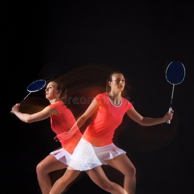 Young Woman Playing Badminton Over Black Background Stock Image - Image ...