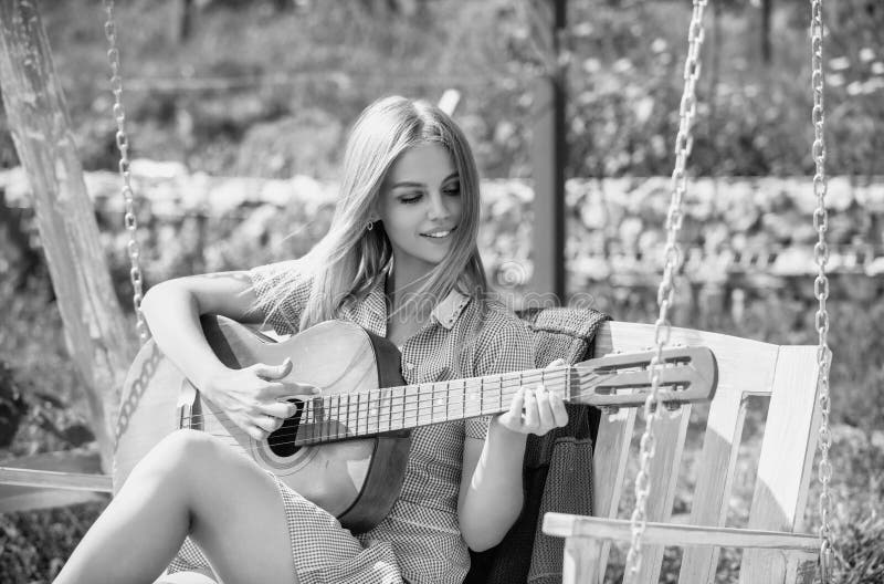 Young Woman Playing Guitar in Spring Park. Stock Image - Image of ...