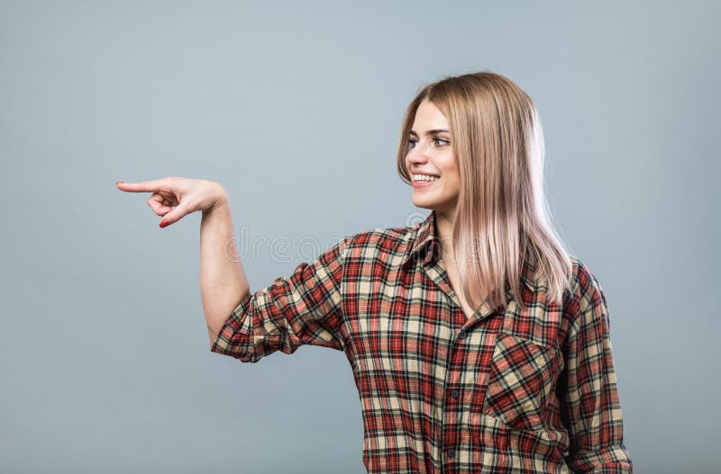 Young woman pointing stock photo. Image of caucasian - 90059104