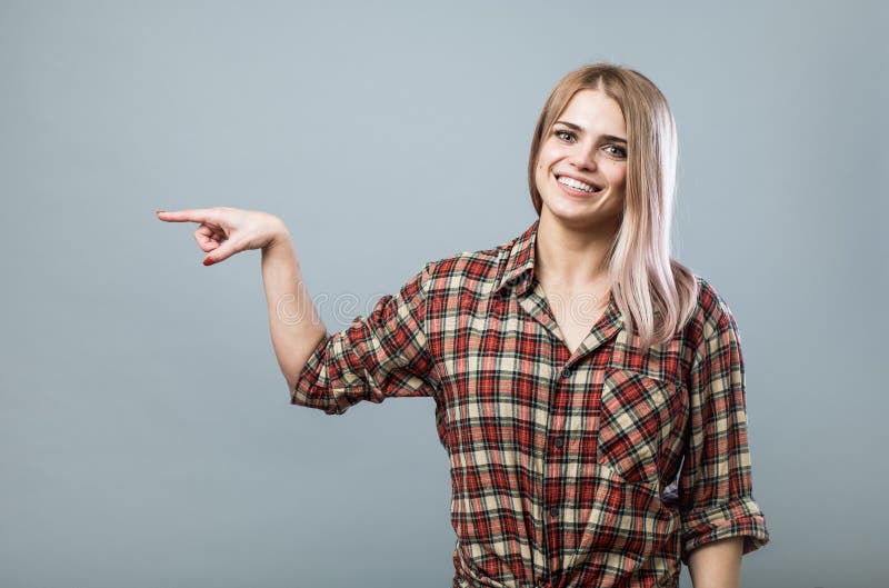 Young woman pointing stock photo. Image of confident - 97344564