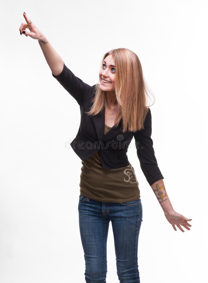 Happy Woman Pointing To the Side Standing in Full Length Stock Photo ...