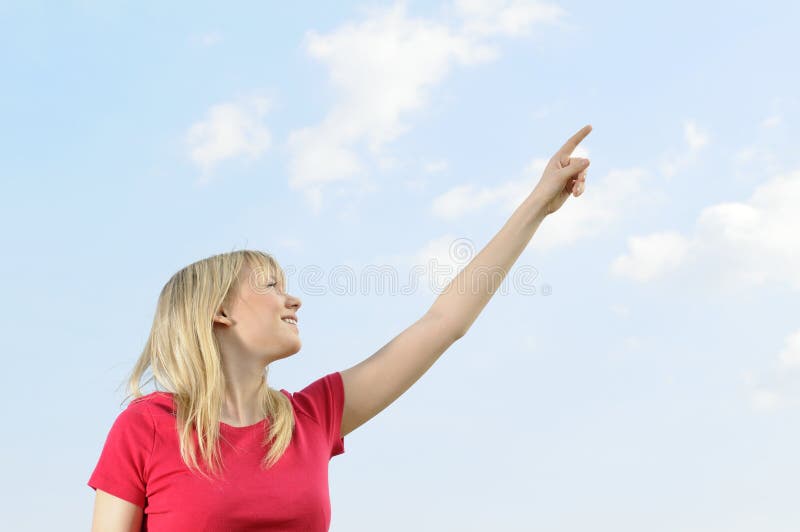 Young woman points the sky stock image. Image of sign - 19230659