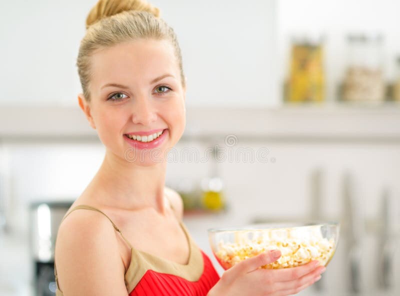 Young woman with popcorn stock photo. Image of caucasian - 46765892