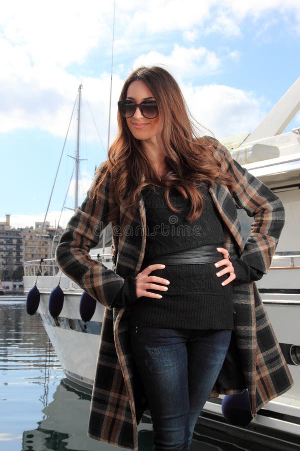 Young woman at the port stock photo. Image of pose, beauty - 23016584