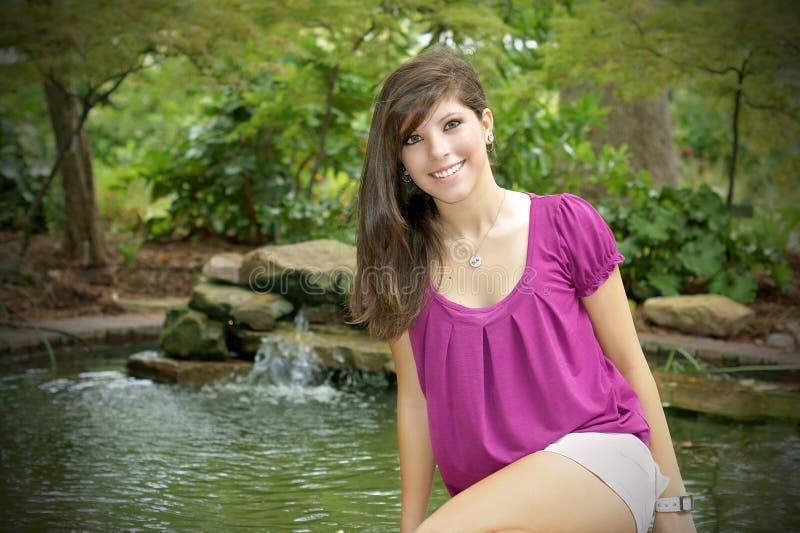 Young Woman Posing in a Pond Stock Image - Image of pleasing, closeup ...