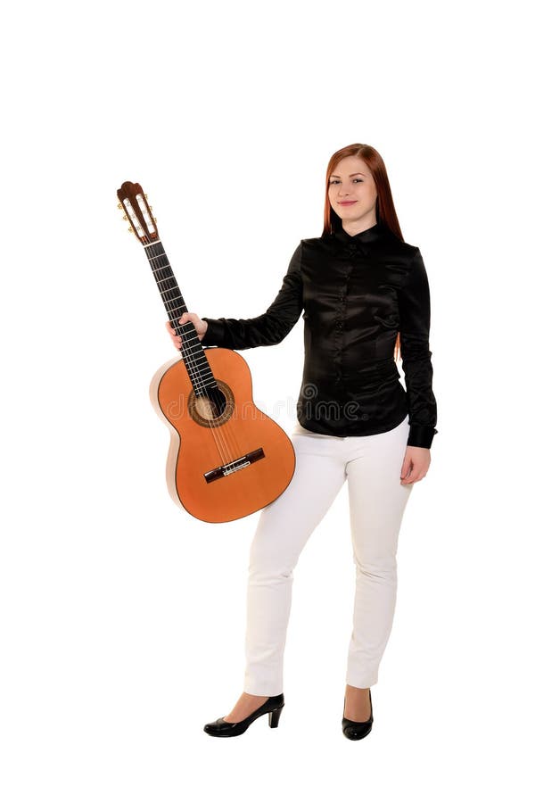 Young Woman Posing in the Studio Holding a Classical Guitar Stock Image ...