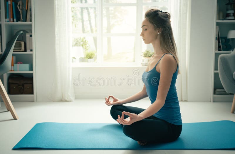 Young Woman Practicing Meditation at Home Stock Photo - Image of people ... Young Woman Practicing Meditation at Home Stock Photo - Image of people ...