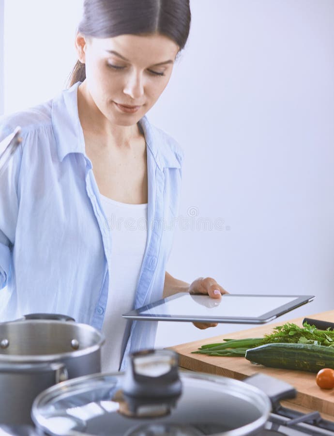 A Young Woman Prepares Food In The Kitchen Healthy Food Vege Stock