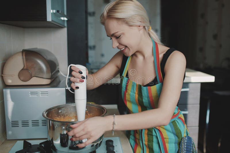Young Woman Preparing Pumpkin Soup Stock Photo - Image of freshness ...