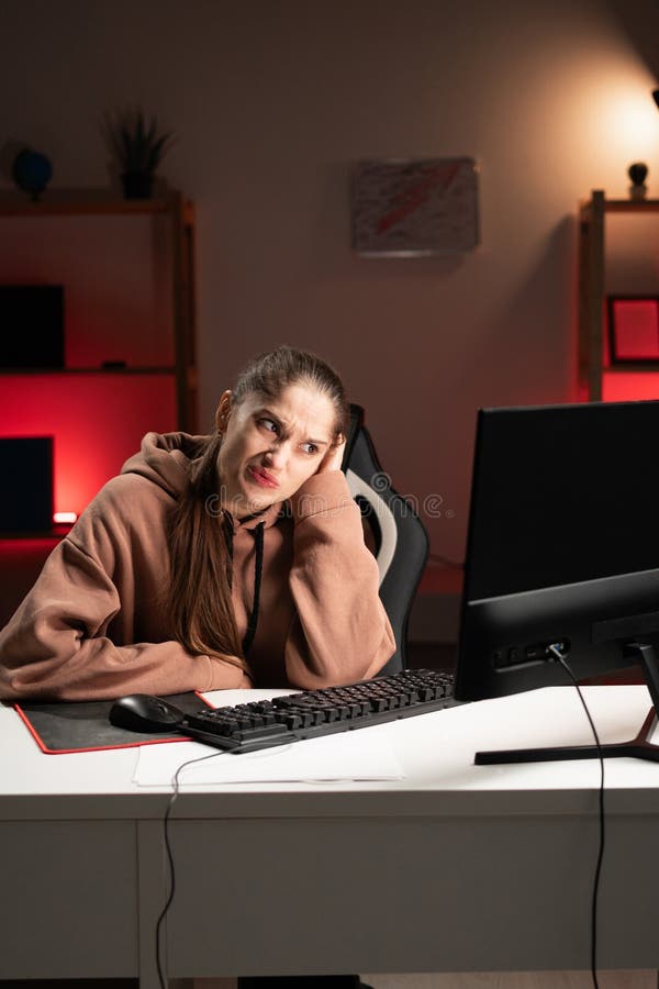 Young Woman Programmer in Hoodie Working Overtime at Night Using Pc at ...