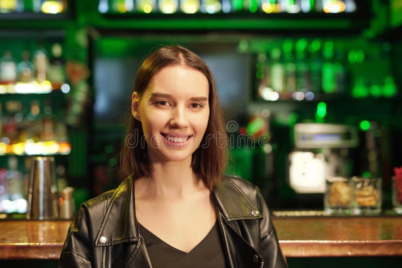Young woman in pub stock image. Image of relaxation - 211402215