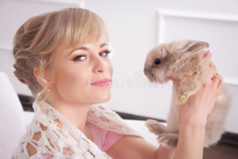 Young Woman with a Rabbit in Hands Stock Image - Image of happy, hands ...