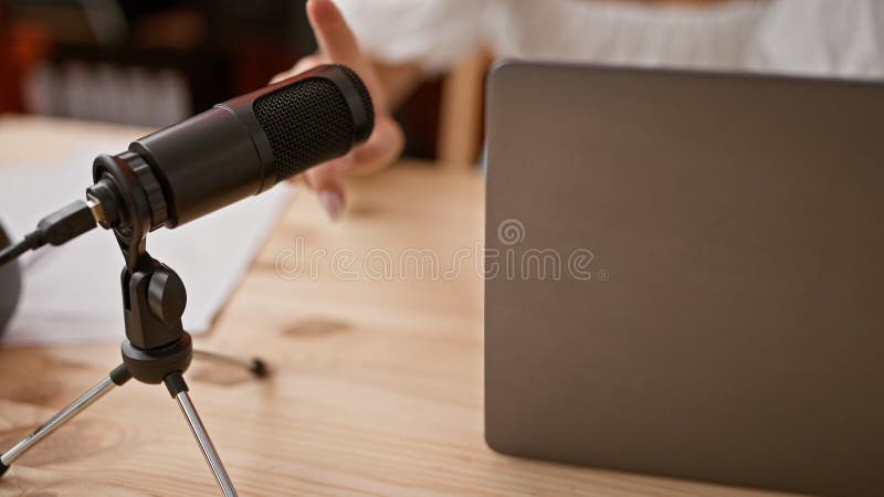 Young Woman Radio Reporter Touching Microphone at Radio Studio Stock ...