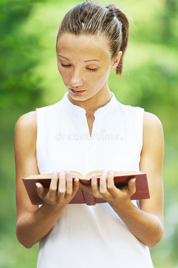 Young woman reading book stock photo. Image of head, calm - 24778920