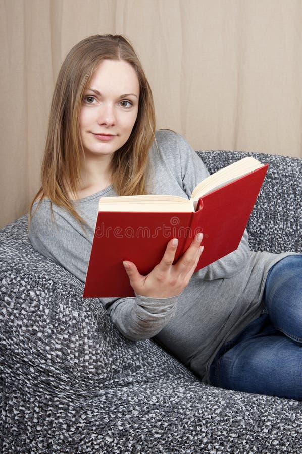 Woman reading a book stock image. Image of jeans, blonde - 30057107