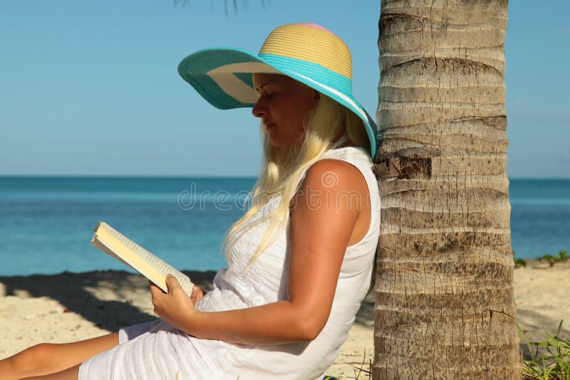 Young Woman Reading a Book at Beach Stock Photo - Image of white ...