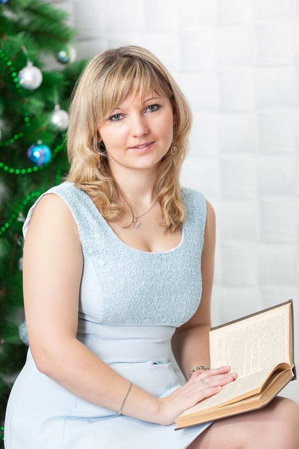 Woman is Reading a Book on a Beach Stock Image - Image of girl, beauty ...