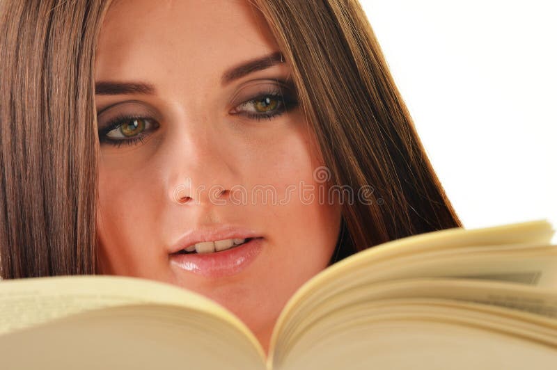 Young woman reading a book stock photo. Image of isolated - 32378460