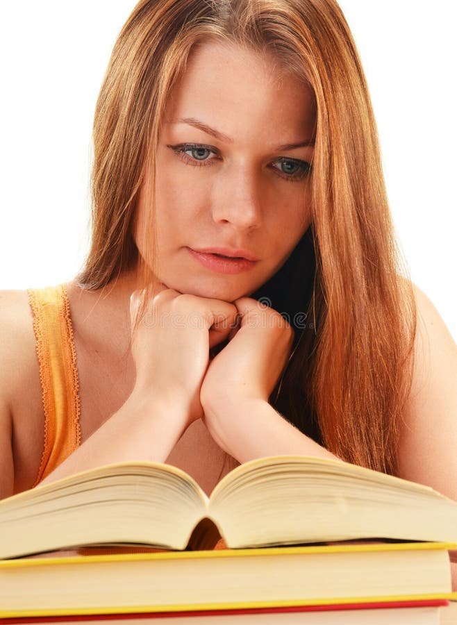 Young woman reading a book stock photo. Image of focused - 32878568