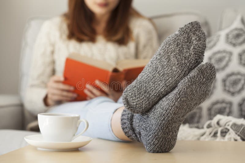 Young Woman Reading Book in Home Stock Photo - Image of sitting ...