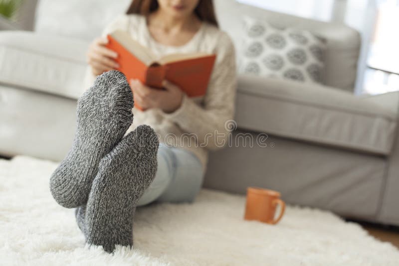 Young Woman Reading Book in Home Stock Photo - Image of living ...