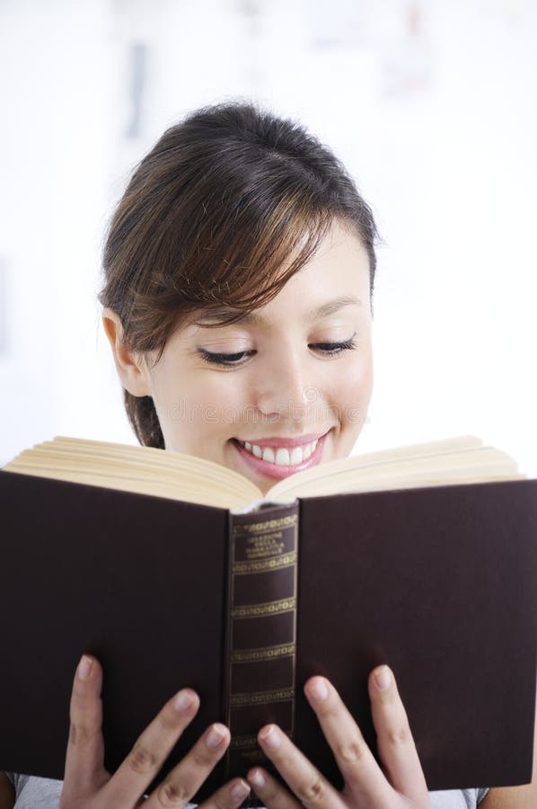 Young Woman Reading Book in Home Interior Stock Image - Image of ...