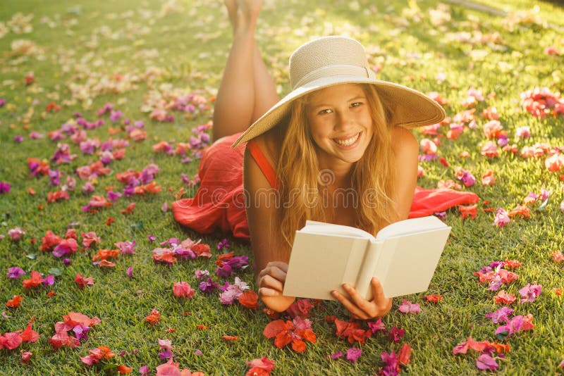 Young Woman Reading Book Outside Stock Image - Image of book, park ...