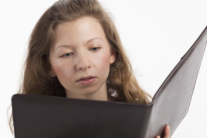 Young Woman is Reading in a Folder Stock Image - Image of document ...