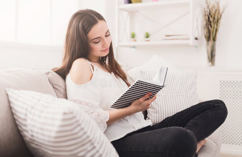 Young Woman Reading Her Notes Stock Photo - Image of people, planning ...