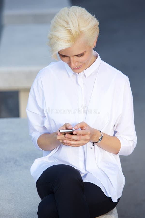 Young Woman Reading Mobile Text Message Stock Photo - Image of looking ...