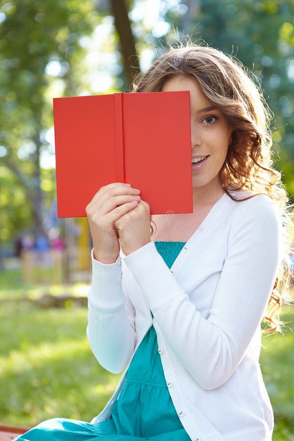 Young woman reads book. stock photo. Image of studying - 41725252